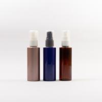 China Amber 30ml 40ml Cylinder Plastic Bottle With Sprayer Lotion Pump for sale
