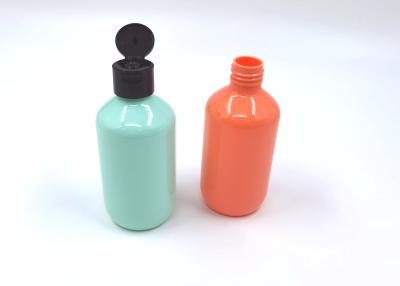 China Orange PET Plastic Cosmetic Bottles 100ml 200ml 250ml Shampoo Container for sale