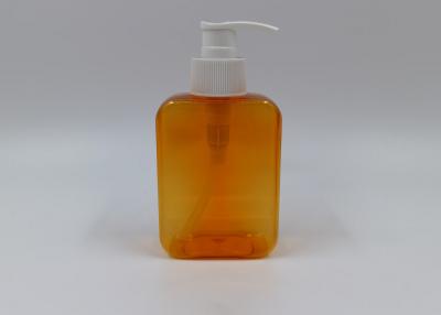 China Orange Clear Flat PET Cosmetic Bottle 180ml with Lotion Pump for Hand Wash Body Cream for sale