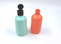 China Oblique Shoulder PET Plastic Bottle With Black Fold Cap 300ml for sale