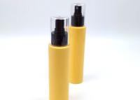 China Bright Yellow PET Cosmetic Bottles 120ml 150ml with Black Sprayer and Transparent Cup for sale