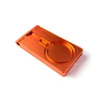 China CNC Machined 6061-T6 Aluminum Foldable Phone Stand Housing Orange Anodized Magnetic Wireless Charger Enclosure for sale