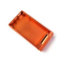 China CNC Machined 6061-T6 Aluminum Foldable Phone Stand Housing Orange Anodized Magnetic Wireless Charger Enclosure for sale