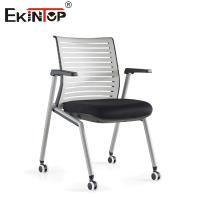 China Powder Coating Frame Training Chair Mesh Backrest With Writing Tablet Armrest And Swivel Casters for sale