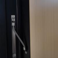China Handle Black Wooden Aluminium Garden Door Noiseless Aluminium Pivot Entrance Doors for sale