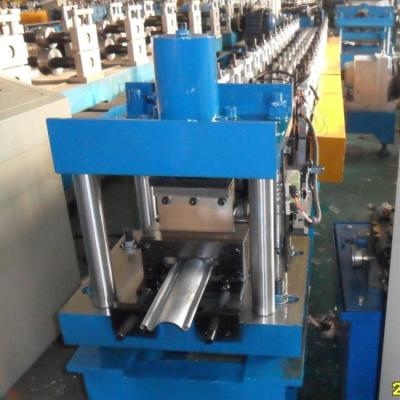 China YX77 Steel Shutter Door Roll Forming Machine with 0.3-0.8mm Thickness and 5.5kW Motor for sale