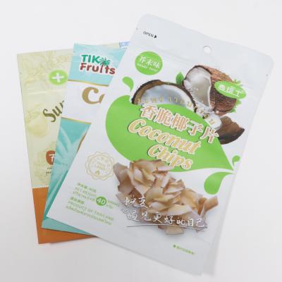 China Disposable Snacks Dried Fruit Pouch Ziplock Top Heat Seal Nylon Flat Bottom Food Storage Plastic Packaging Bag for sale