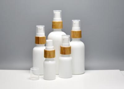 China Glass Skin Essence Oil Packaging Opal White Glass Bottles With Bamboo Pump Spray, Glass Primary Cosmetic Containers for sale