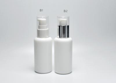 China 40ml boston round opal white glass bottles with treatment pump, glass serum packaging, medical skincare for sale