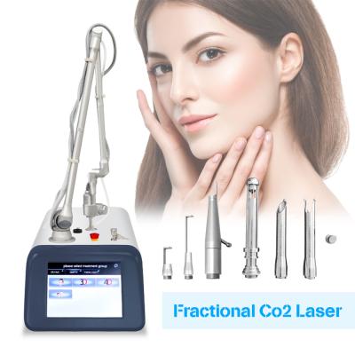 China Portatil Fraccionado Equipment Fractional Co2 Laser System Machine For Skin Lift And Stretch Mark Removal for sale