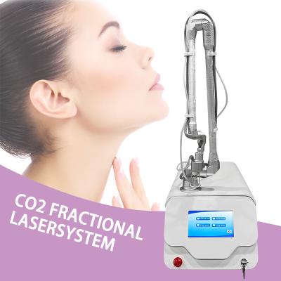 China Laser Q-Switch Removes Stretch Marks Acne Scar Removal Co2 Fractional Laser Vaginal Tightening Machine Beauty Salon Equipment for sale