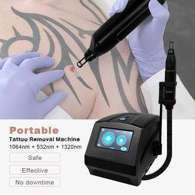 China Carbon Peeling Skin Whitening Q Switched Nd Yag Laser Machine Eyebrow Tattoo Removal Device for sale
