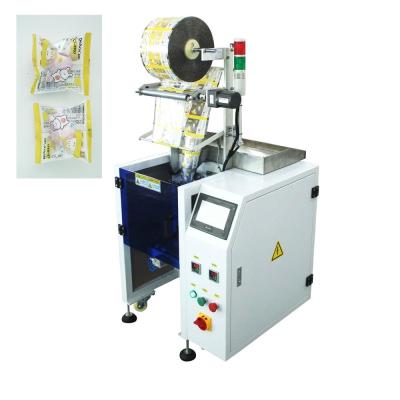 China Automatic Manual Placement Toy Plastic Spare Parts Packaging Machine For Irregular Shape Product for sale