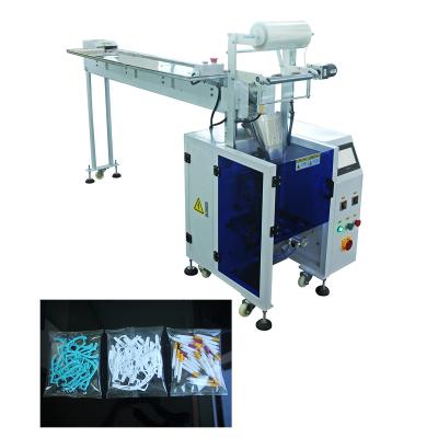 China Customizable  Vertical Floss Screw Counting Machine And Packing Machine With One Vibrating Feeder for sale