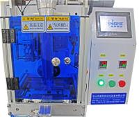 China New Goods Automatic Mixing Count Nuts Angle Type Dragging Bucket Plastic Film Packing Machine for sale