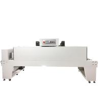 China Hot Sales Heat Shrinking Wrapping Equipment Over Wrapper Iron Part Toys Hardware Shrinking Packaging Machine for sale