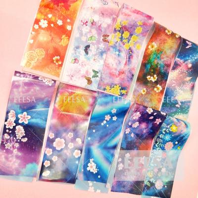 China 2021 New Luxury Galaxy Flower Butterfly Leaf Design Nail Art Transfer Foil Sticker for sale