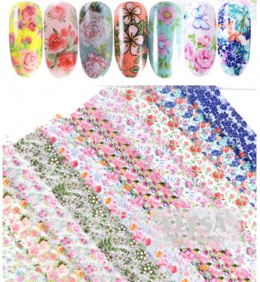 China 10 Designs Star Glue Leaf Rose Flower Art Transfer Nail Design Sticker Foil for sale