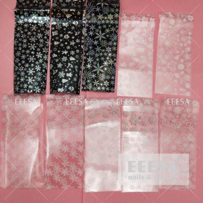 China Hot Holo Gold Black White Snowflake Mesh Pvc Transfer Foil Christmas Nail Ctisker for sale