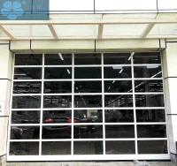 China Sliding 50mm 5000mm Height Glass Panel Garage Doors for sale