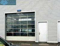 China 220V 2.5mm Galvanized Steel PC Glass Panel Garage Doors for sale