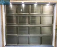 China Easy Installation 4cm Silver Color Insulated Sectional Doors for sale