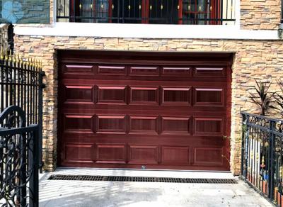 China Automatically 3.0mm Bracket Industrial Sectional Overhead Door for sale