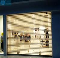 China Commercial Use 3000mm Height 16mm Tube Transparent Roller Door for sale