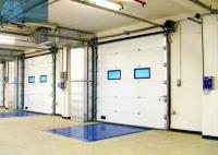 China Sectional AC110V 0.376mm Steel Industrial Roll Up Doors for sale