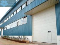 China 4000mm Height 550mm Panel Industrial Overhead Door for sale