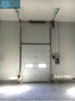 China 4000mm Height 550mm Panel Industrial Overhead Door for sale