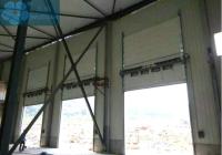China 4000mm Height 550mm Panel Industrial Overhead Door for sale