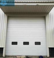 China 4000mm Height 550mm Panel Industrial Overhead Door for sale