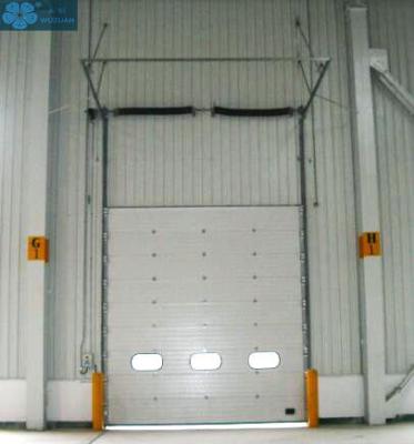 China 4m Width 450mm Panel Industrial Sectional Overhead Door for sale