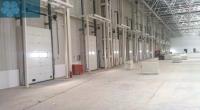 China 4m Width 450mm Panel Industrial Sectional Overhead Door for sale