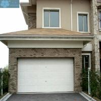 China Colour Coated Sectional Overhead Garage Door Finger Protection for sale