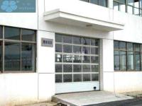 China Sectional Overhead Organic Tempered Glass Sliding Garage Door for sale