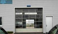 China Organic Glass Panel Aluminium Alloy Frame Sectional Overhead Door for sale