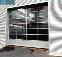 China Organic Glass Panel Aluminium Alloy Frame Sectional Overhead Door for sale