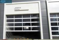 China Electric Sectional Overhead Folding 5mm Glass Panel Garage Door for sale