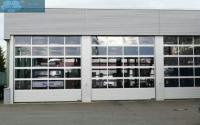 China Electric Sectional Overhead Folding 5mm Glass Panel Garage Door for sale