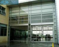 China UV Proof Residential Tempered Glass Sectional Overhead Garage Door for sale