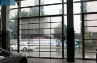 China Transparent PC Glass Commercial Sectional Garage Doors for sale