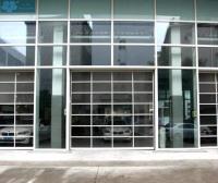 China Transparent PC Glass Commercial Sectional Garage Doors for sale