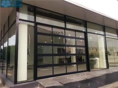 China Aluminium Frame Glass Panel Commercial Sectional Doors For Showroom for sale