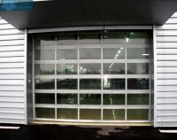 China Aluminium Frame Glass Panel Commercial Sectional Doors For Showroom for sale