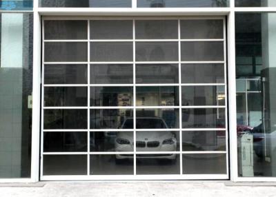 China Aluminum Frame Transparent Glass Panel Sectional Garage Doors for sale