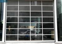 China Aluminum Frame Transparent Glass Panel Sectional Garage Doors for sale