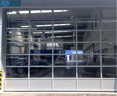 China Remote Control Aluminum Alloy Glass Sectional Garage Door for sale