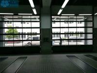 China 5m Width Insulated Glass Sectional Garage Doors for sale